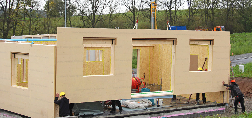 Modular Construction - Assembly of prefabricated building - SGA Design ...